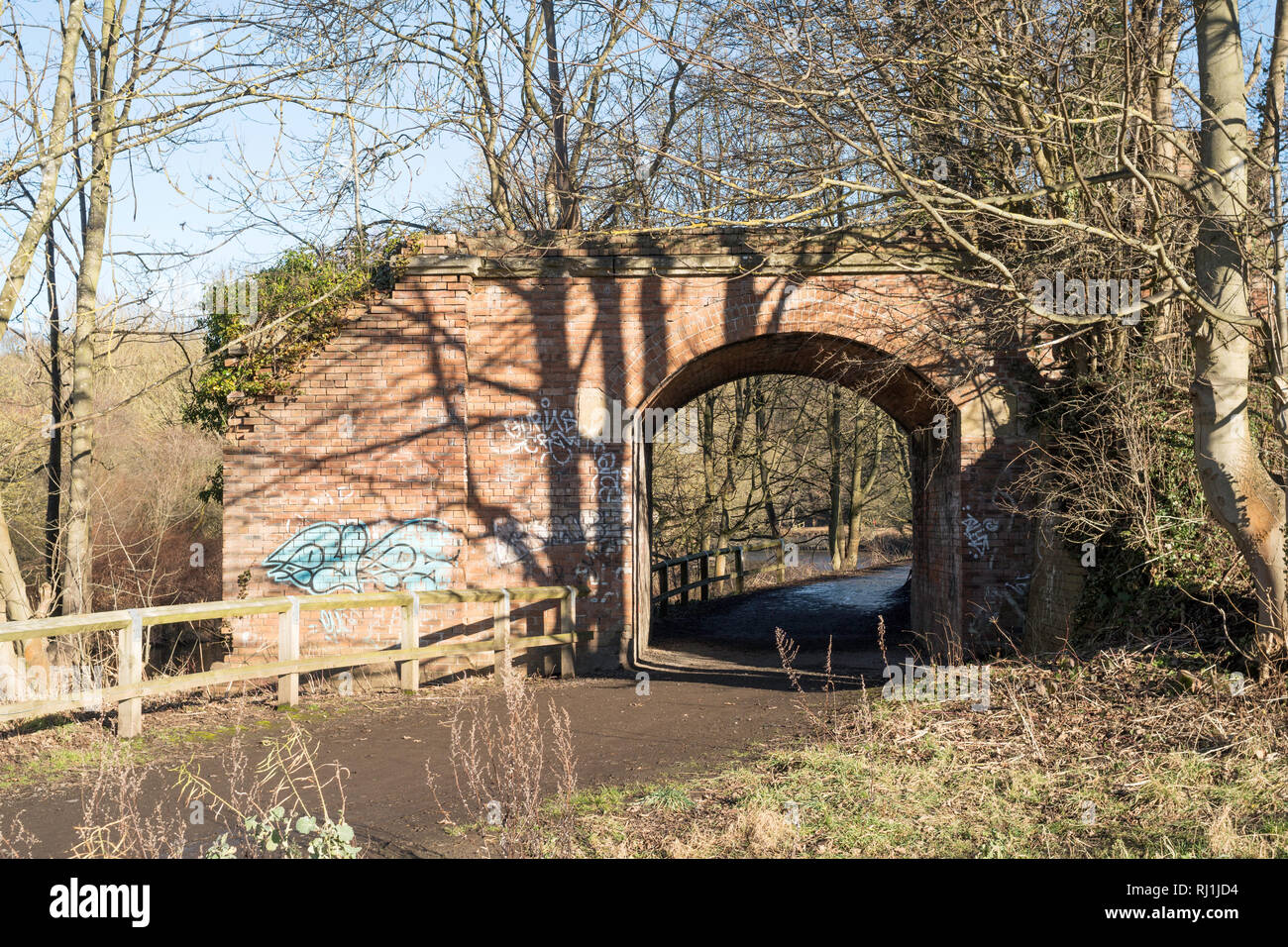 The abutment of the demolished railway bridge that once carried the ...