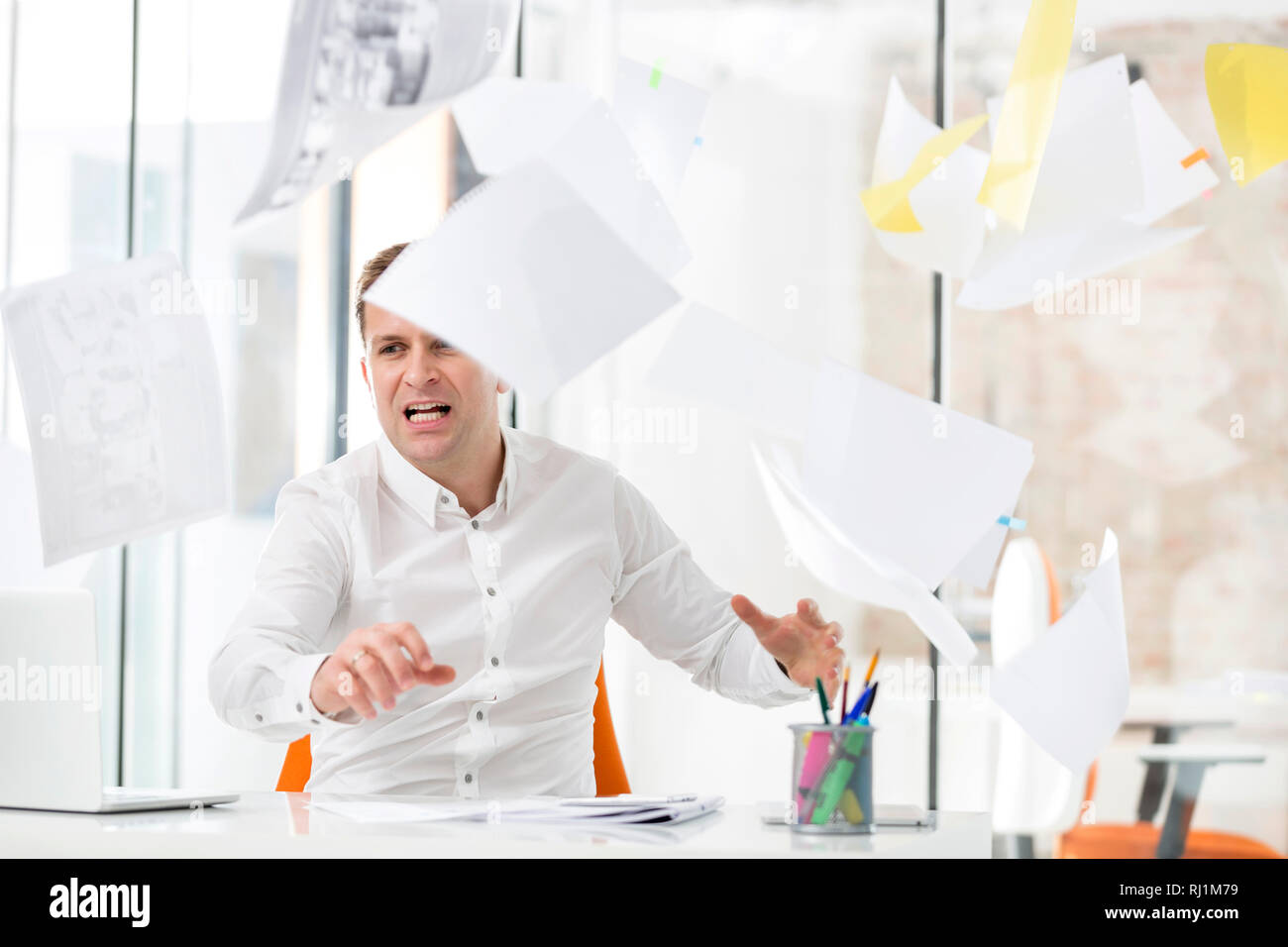 Throwing documents hi-res stock photography and images - Alamy