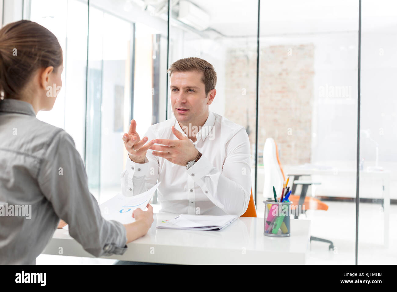 Adult manager hi-res stock photography and images - Alamy