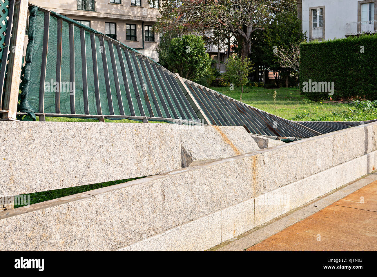 Collapsed fence after a gale. House Insurance concept Stock Photo - Alamy