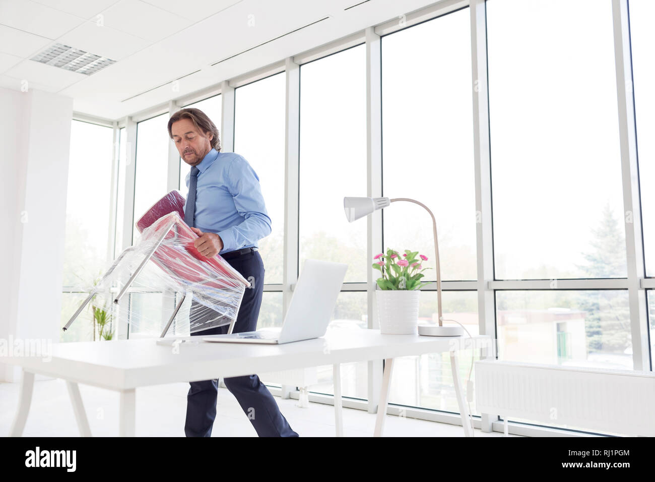 Carrying chair hi-res stock photography and images - Alamy