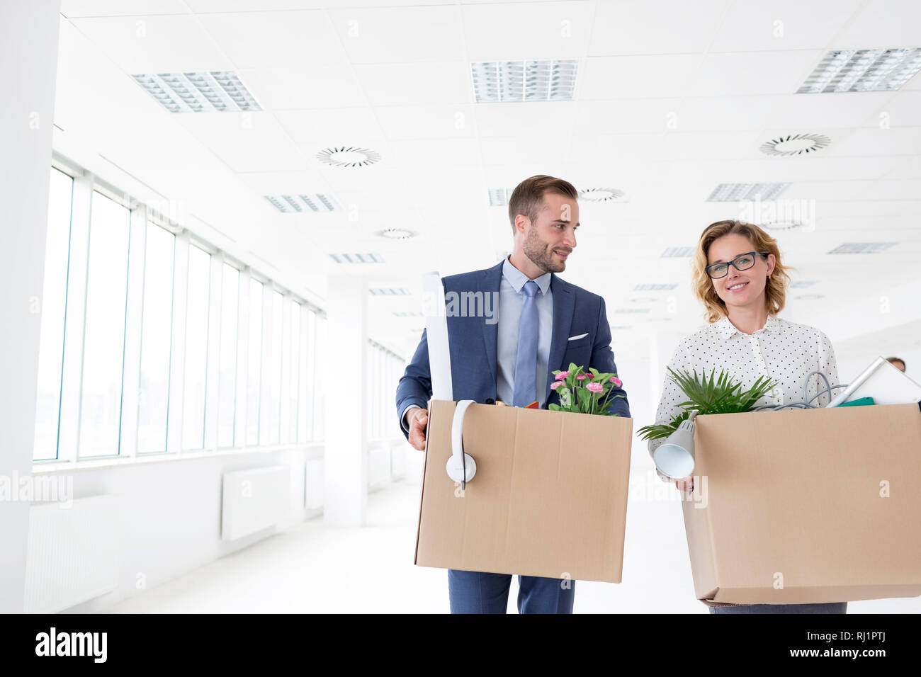 Working carrying holding cardboard box hi-res stock photography and ...