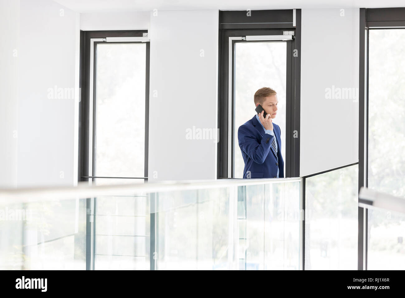 Businessman office railing hi-res stock photography and images - Alamy