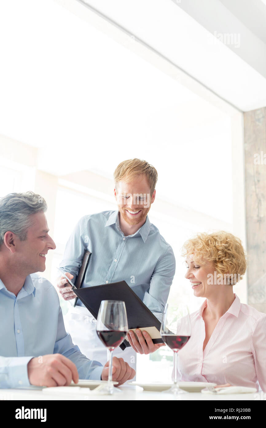 Restaurant waiter menu hi-res stock photography and images - Alamy
