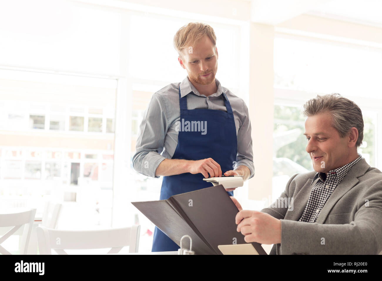 Menu and customer hi-res stock photography and images - Alamy