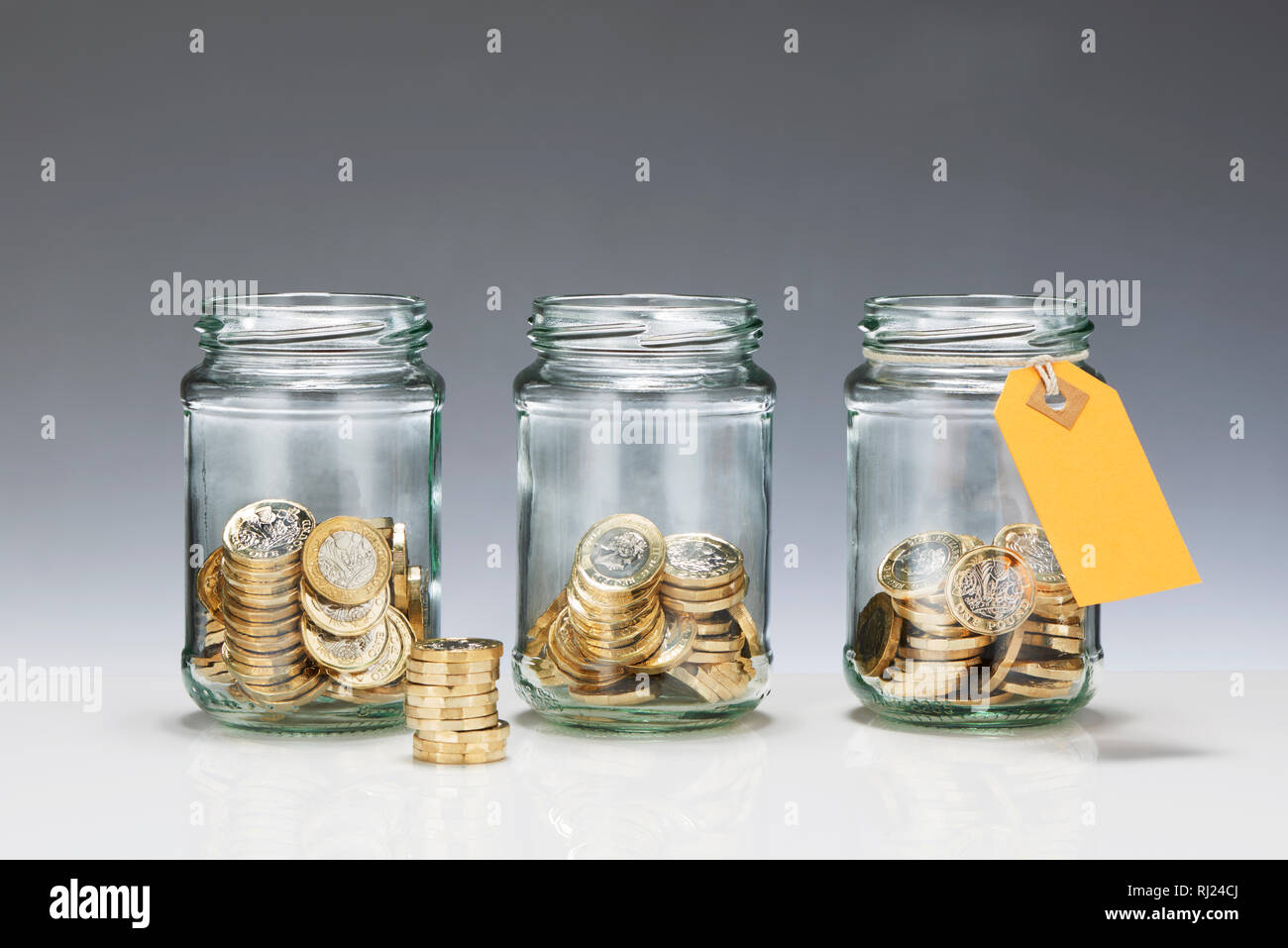Three pound coins hi-res stock photography and images - Alamy