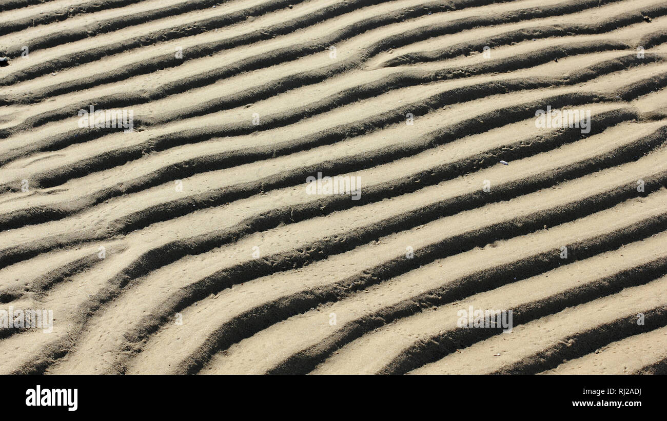 Ripples in the sand Stock Photo - Alamy