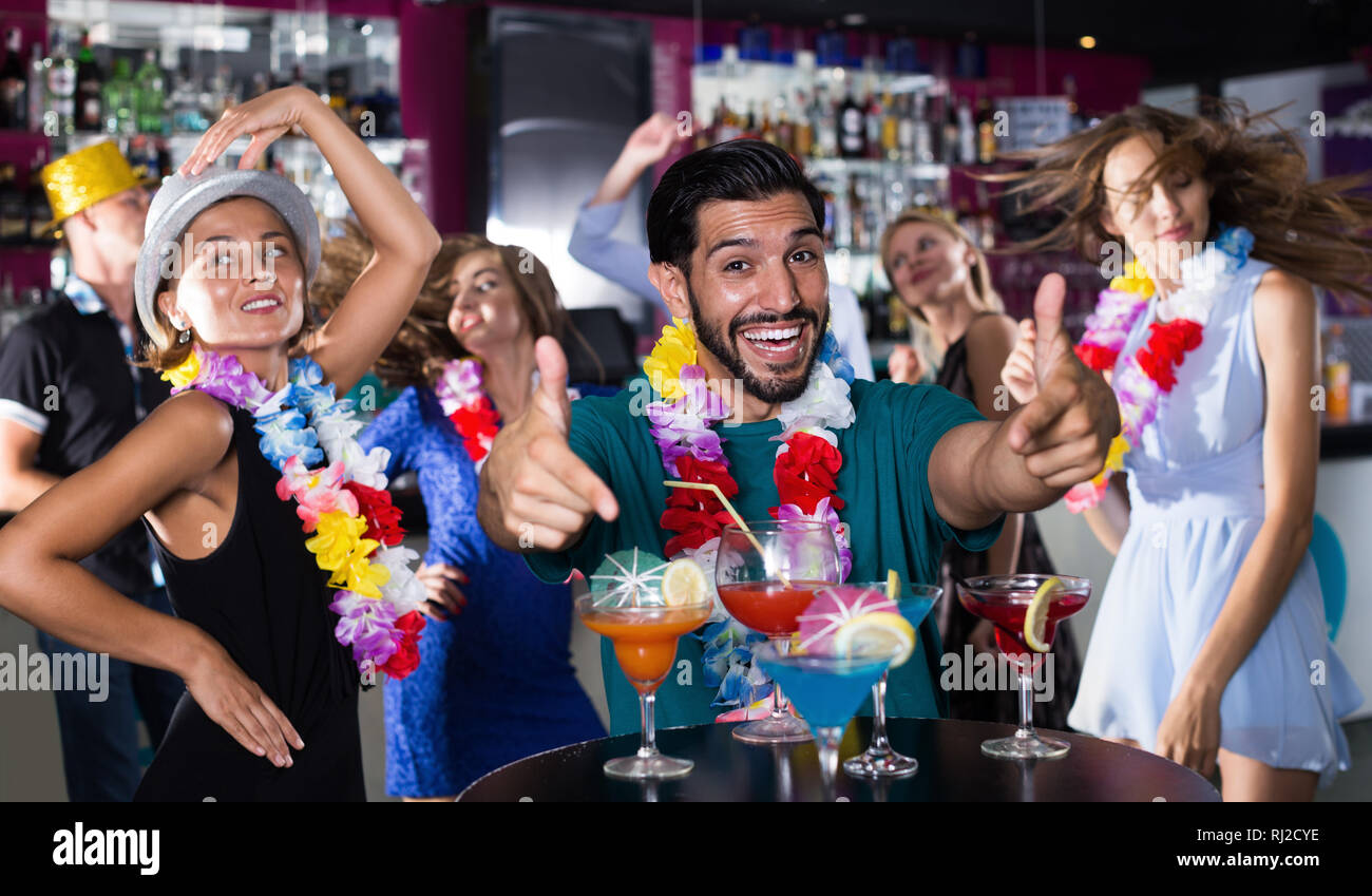 Happy man 31-35 years old is having fun on hawaiian party Stock Photo ...