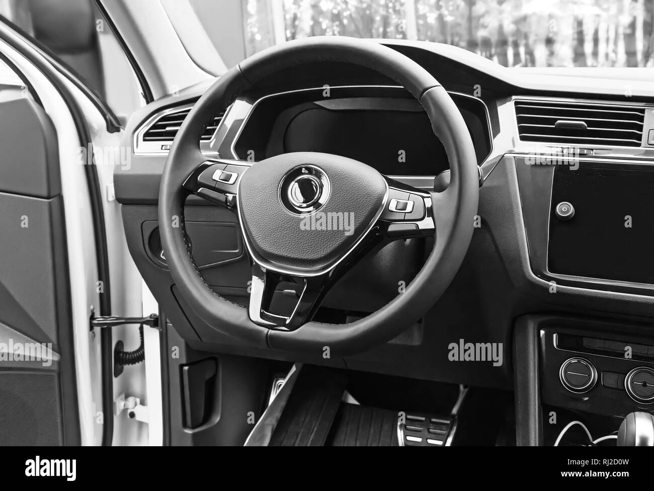 Interior of the car interior with steering wheel and control devices ...