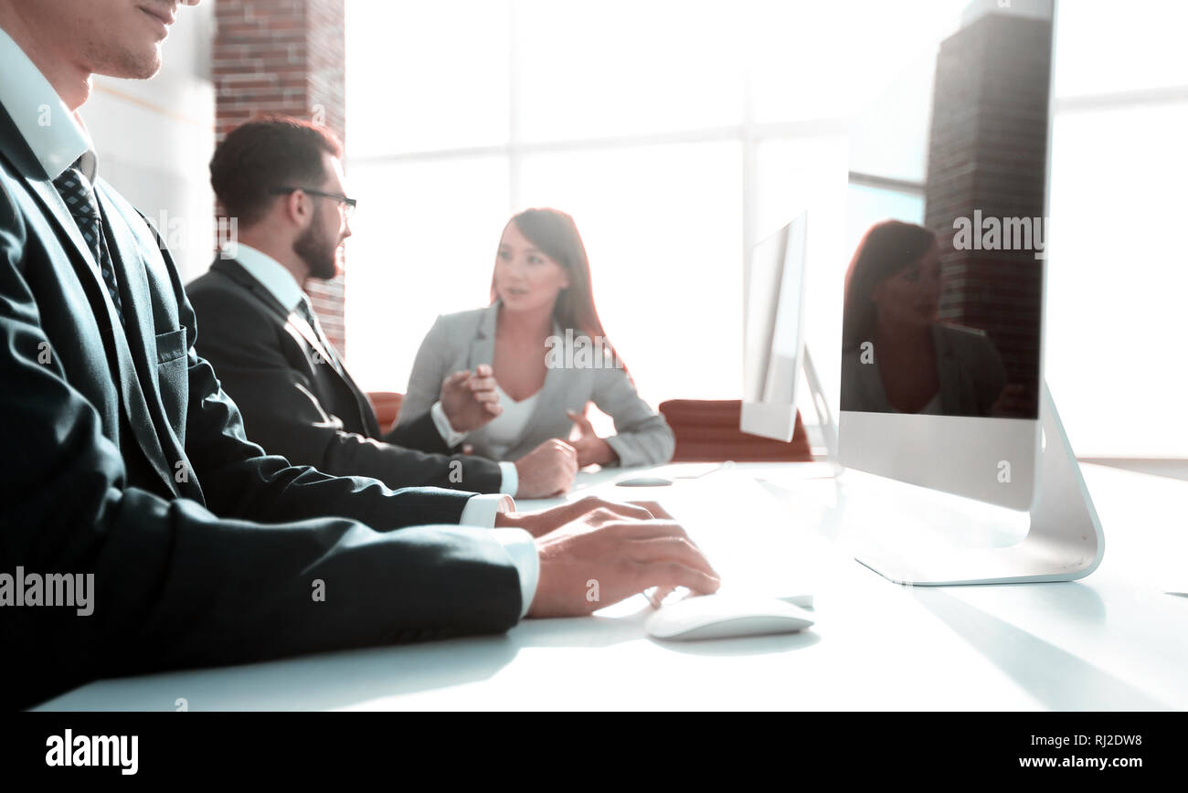 Serious male employees work hi-res stock photography and images - Alamy