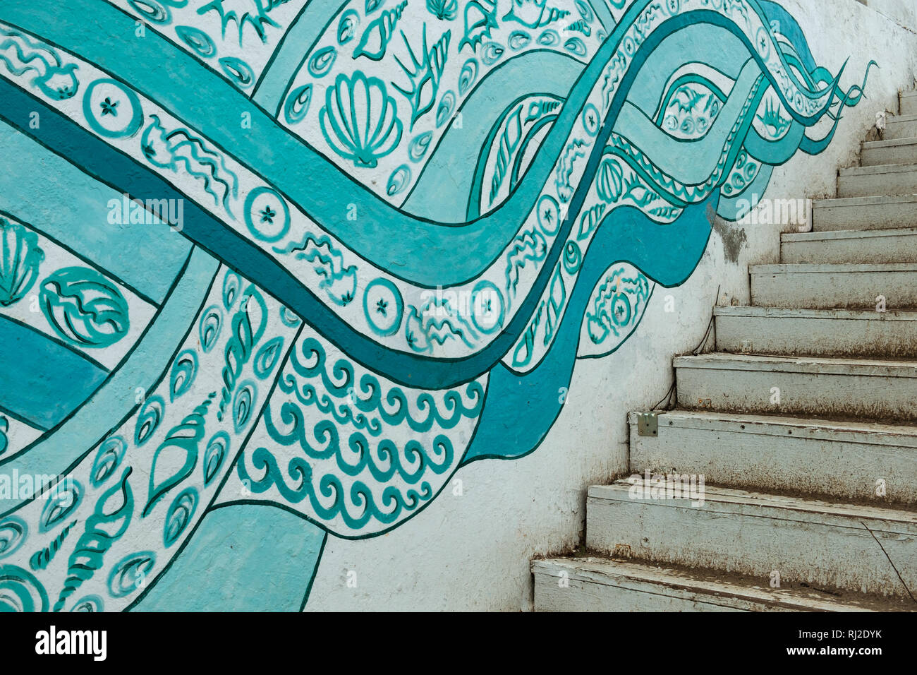 Blue graffiti painting on wall, sea shells and waves, watercolor ...