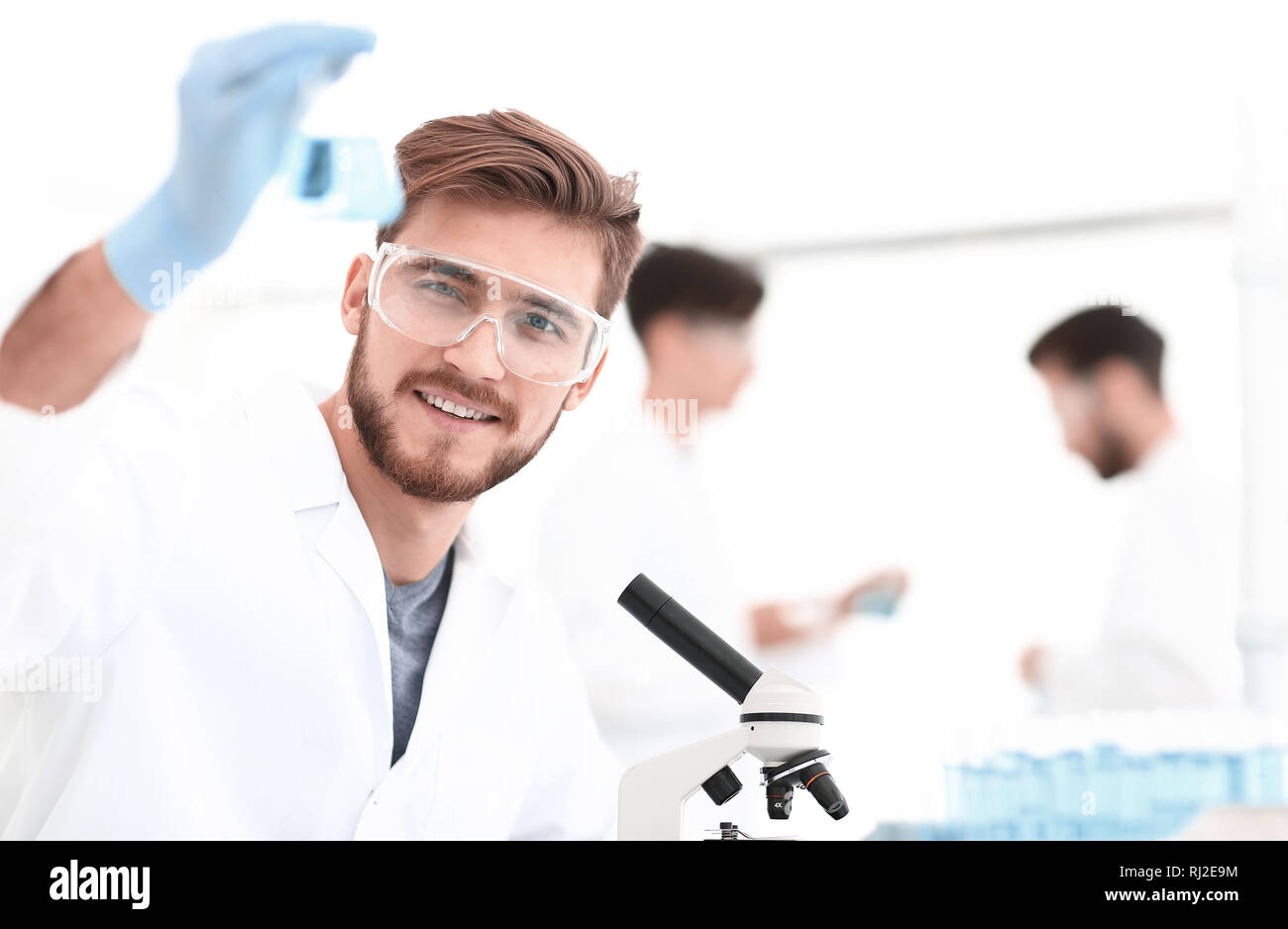 closeup.a scientist doing experiments in the laboratory Stock Photo - Alamy