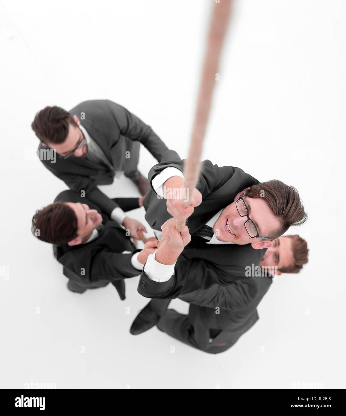 Team helping leader climb hi-res stock photography and images - Alamy