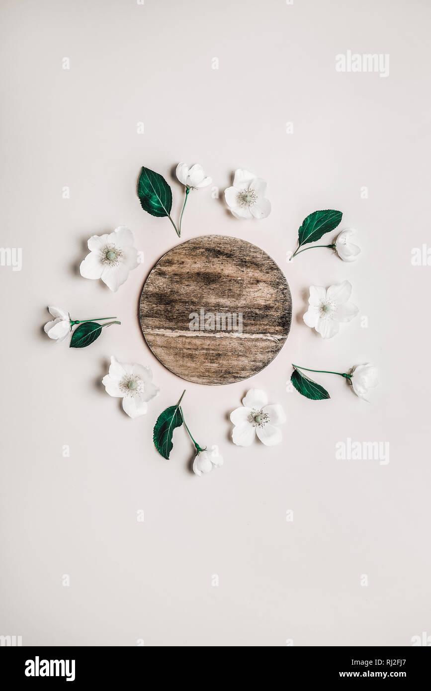 Creative layout of white flowers and plants with copy space for writing ...