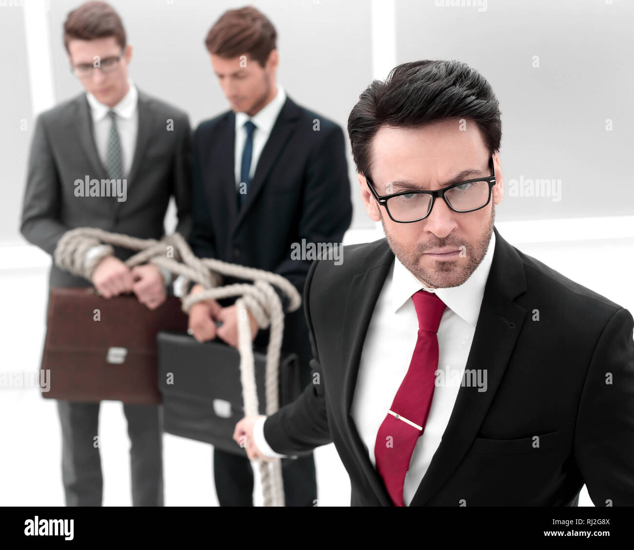 Serious businessman tied up work hi-res stock photography and images ...