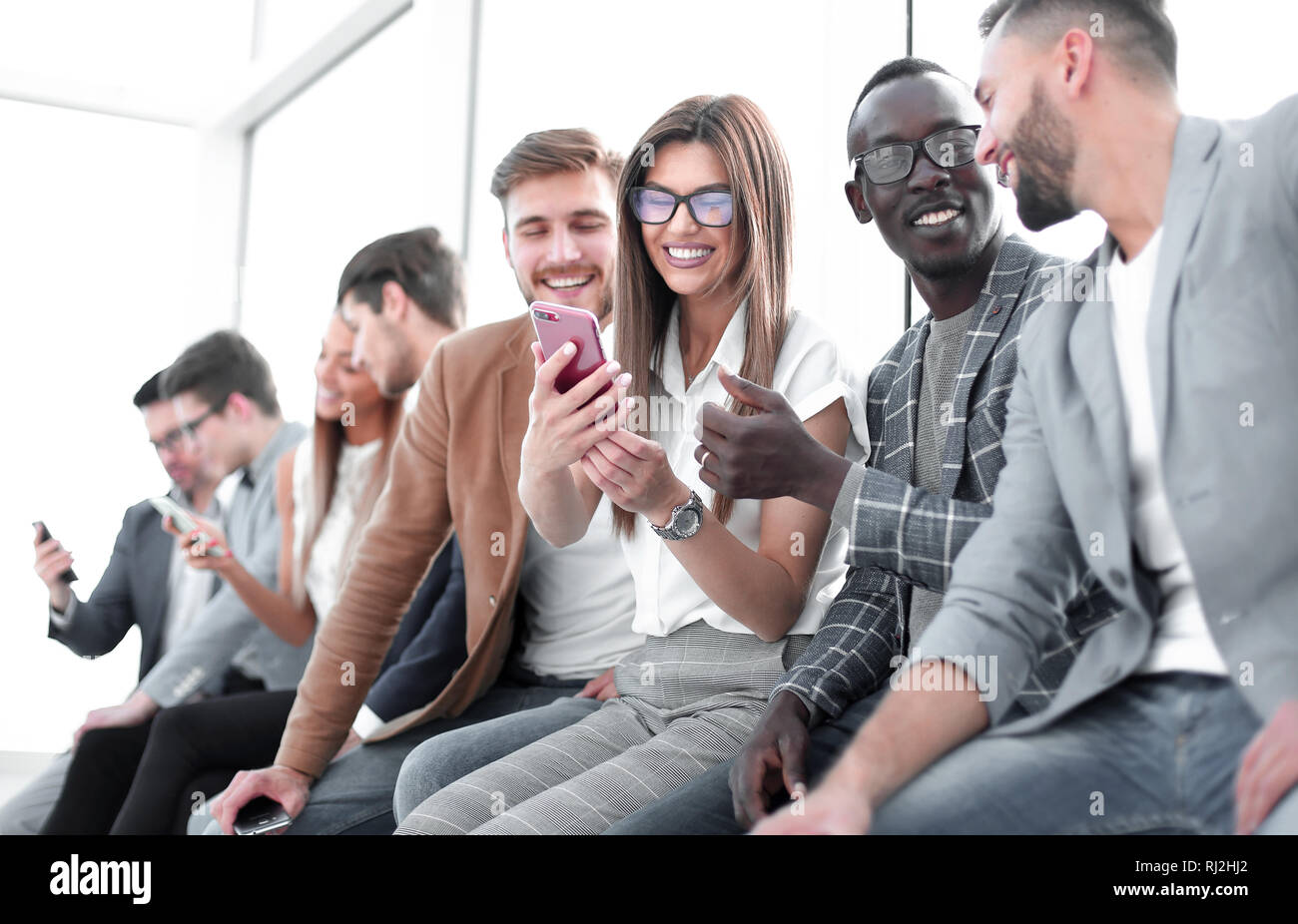 group of young people with smartphones Stock Photo - Alamy