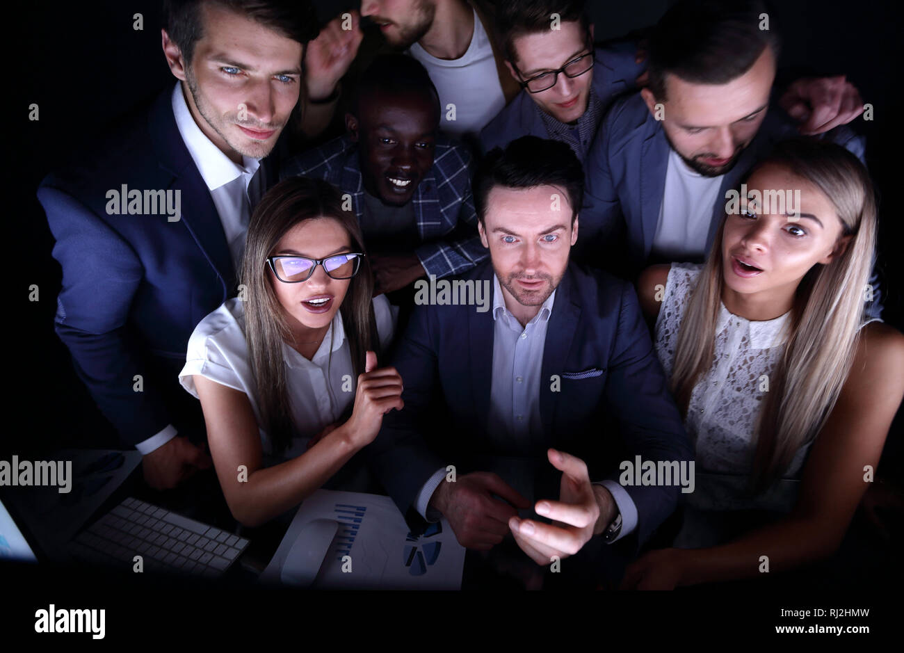 corporate team of employees looking at the computer screen Stock Photo ...