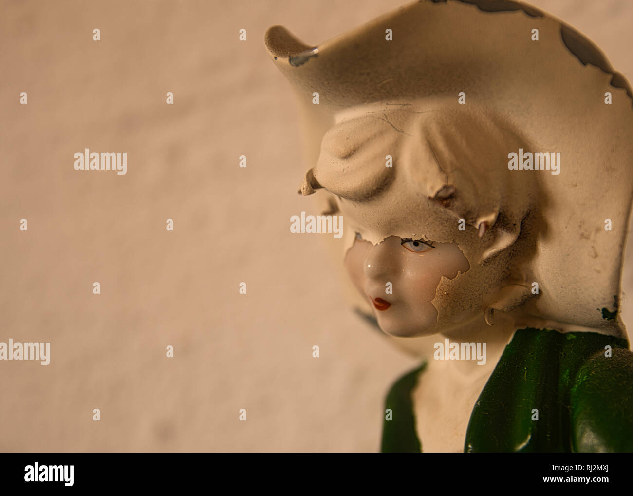 Broken porselain doll Stock Photo - Alamy