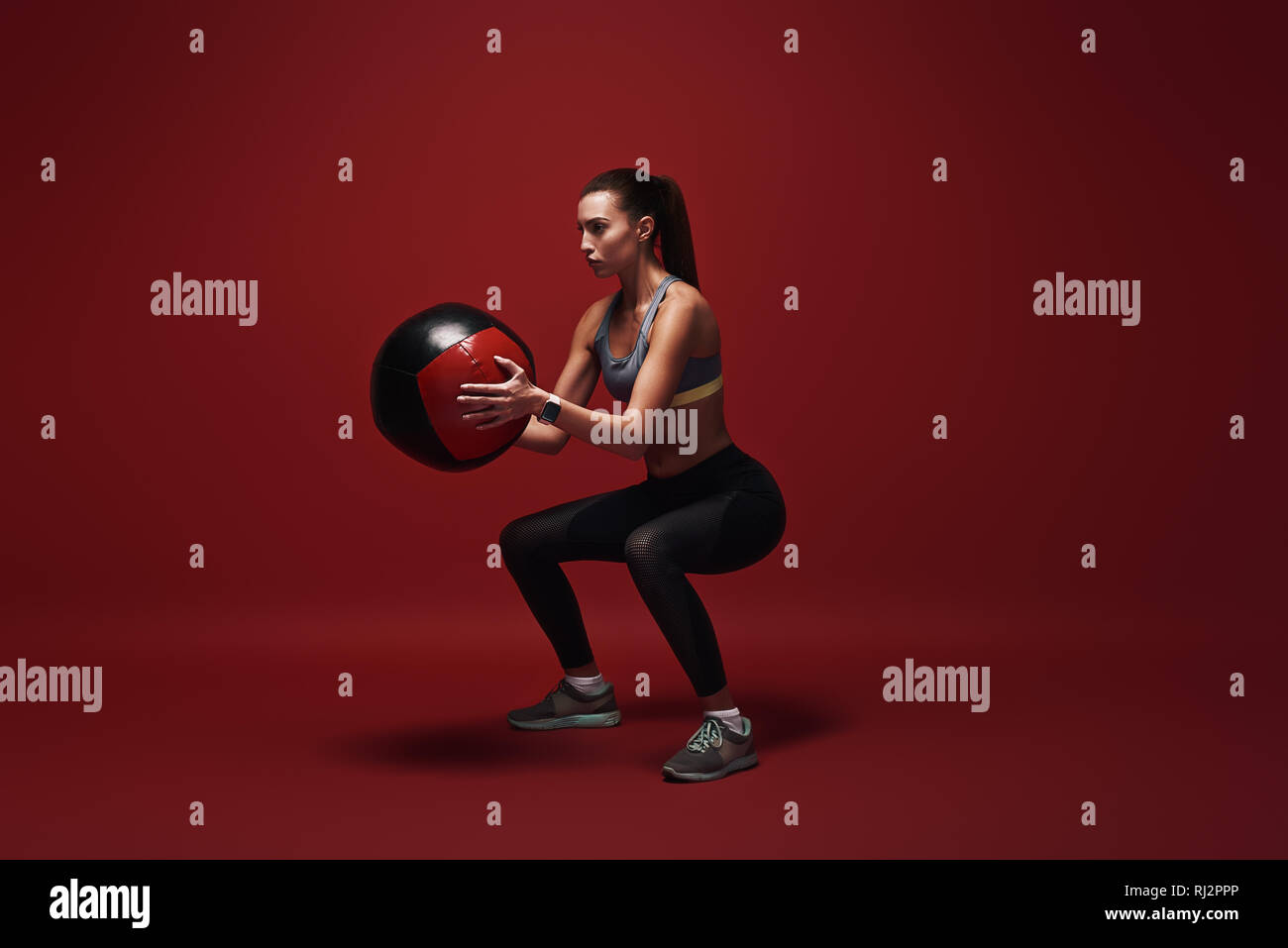 Woman red exercise ball hi-res stock photography and images - Alamy