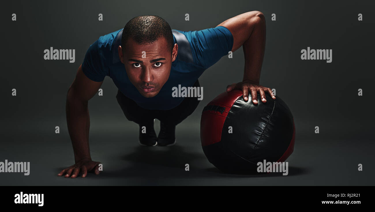 Front view portrait of concentrated, confident, sporty, athletic ...