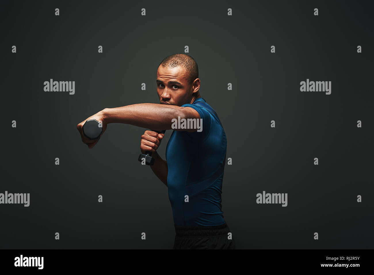 Flexing muscles man hi-res stock photography and images - Alamy
