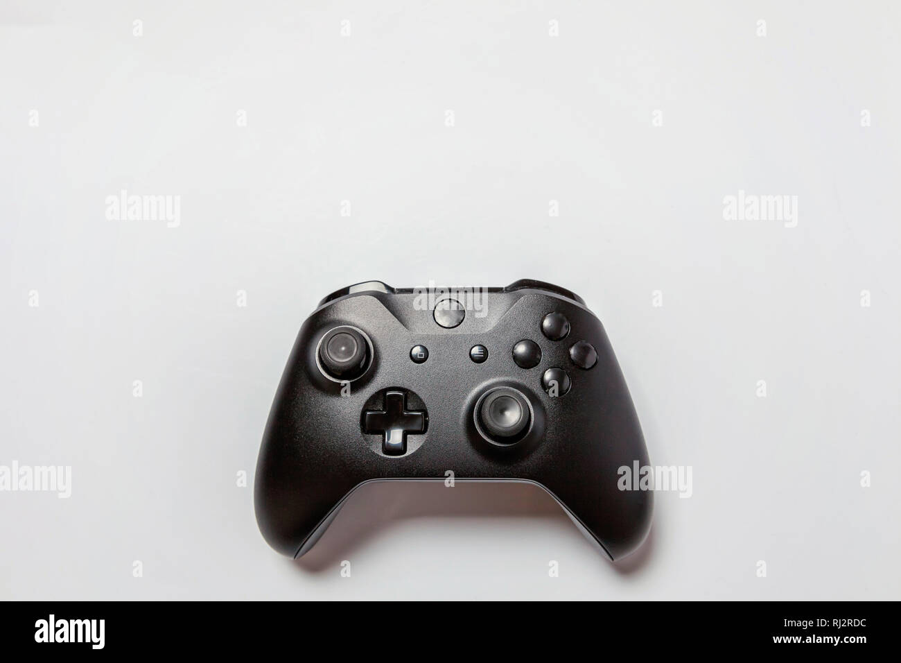 Black joystick gamepad, game console isolated on white background ...
