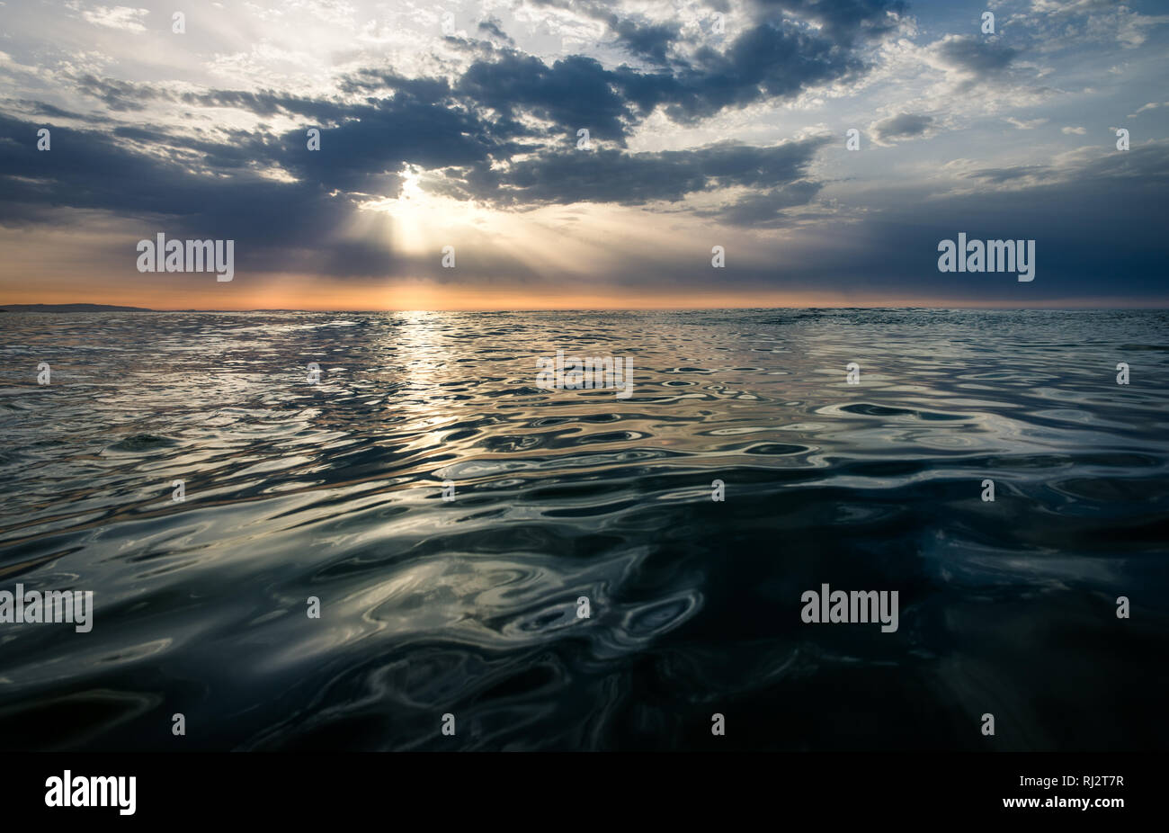 Perspective of sunset Inside ocean Stock Photo - Alamy