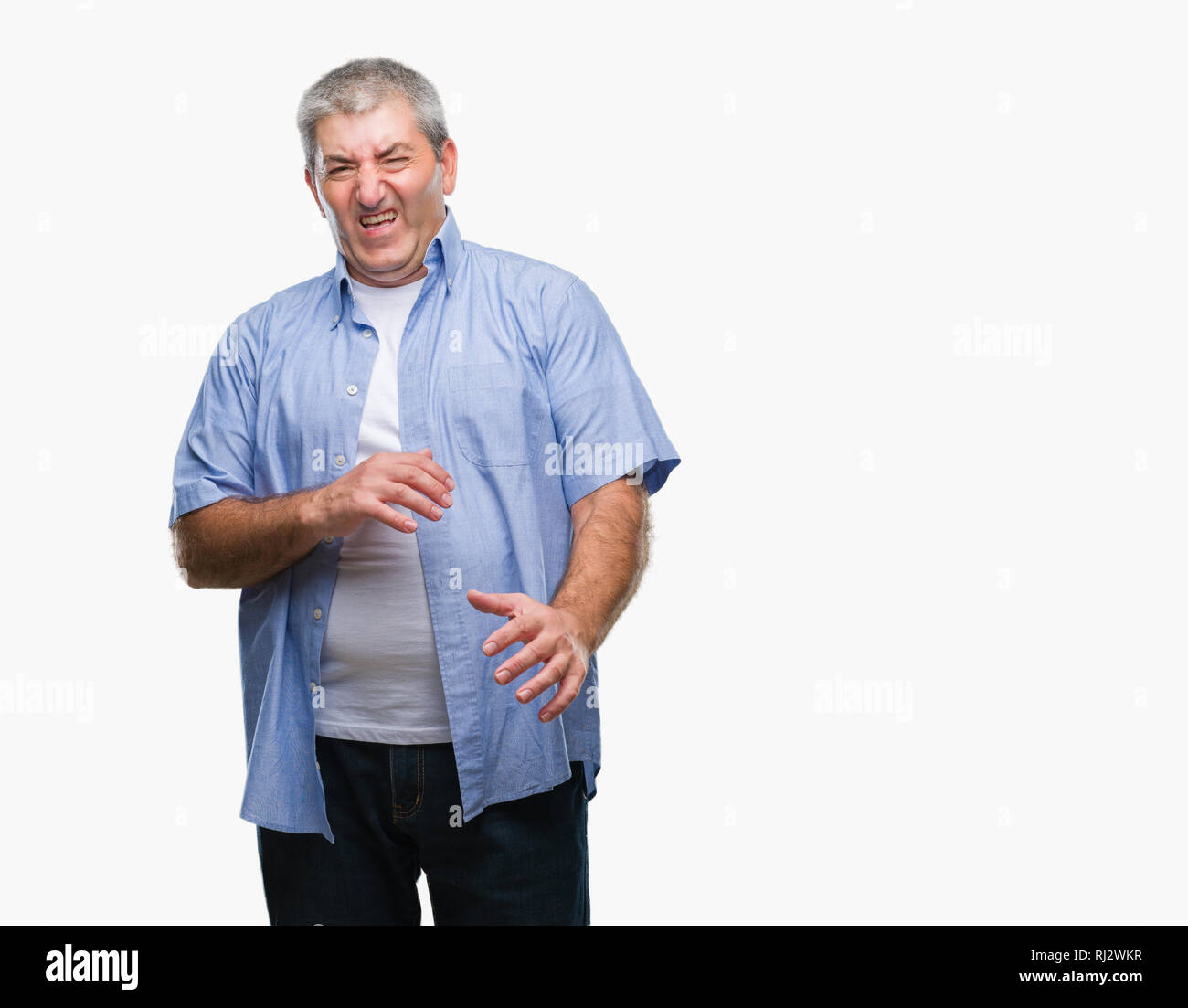 Handsome senior man over isolated background disgusted expression ...