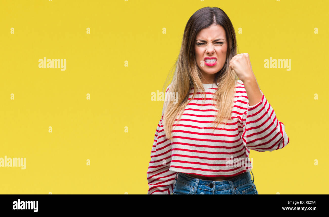 Young beautiful woman casual stripes winter sweater over isolated ...