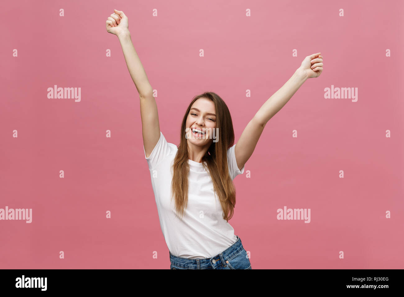 Happy successful young woman with smiling,shouting and celebrating ...