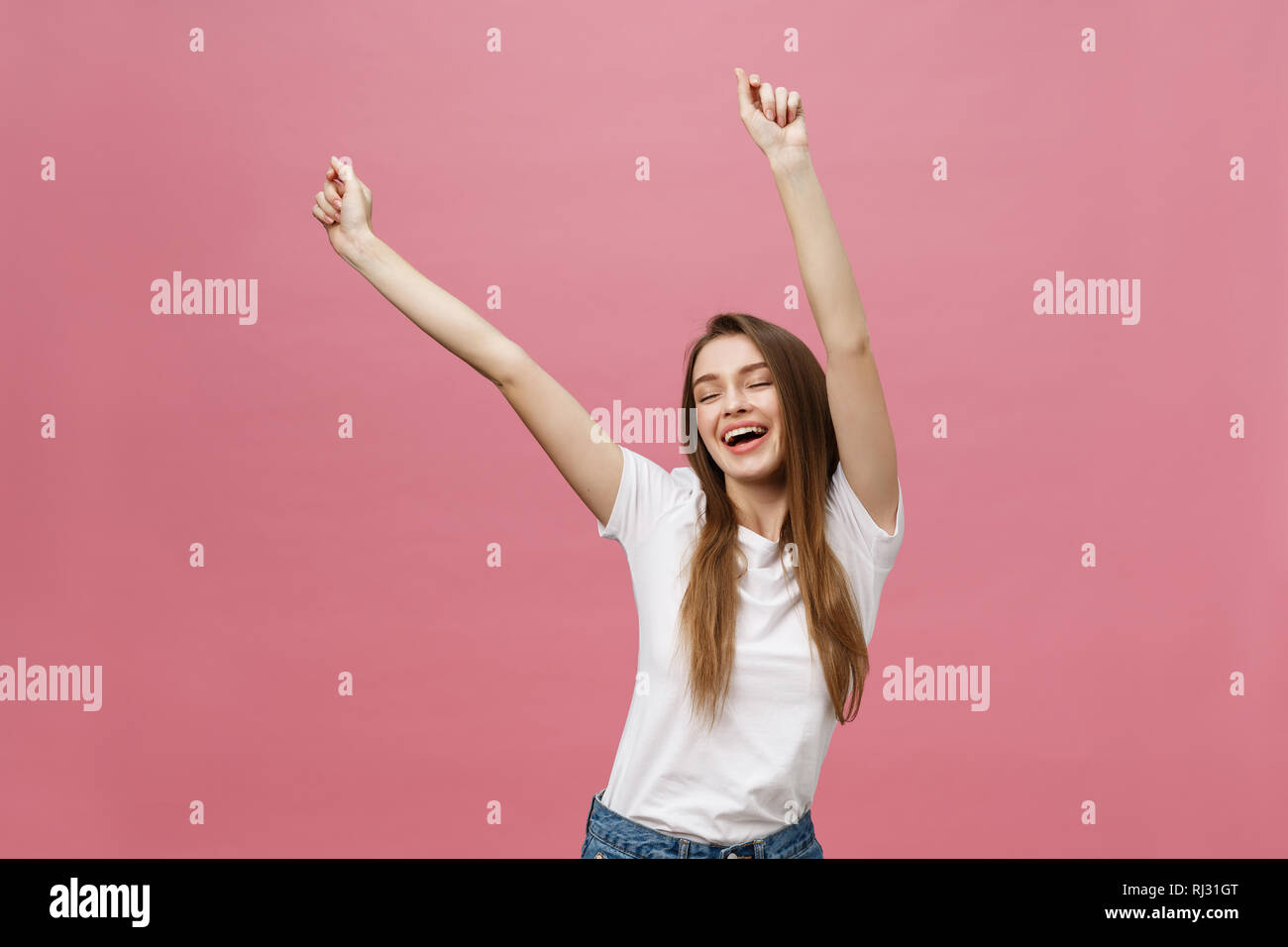 Happy successful young woman with smiling,shouting and celebrating ...