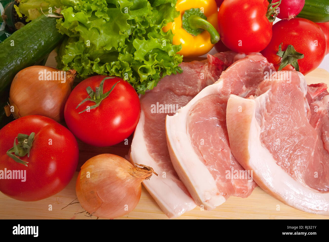 Raw meat and spring fresh and ripe vegetables Stock Photo - Alamy