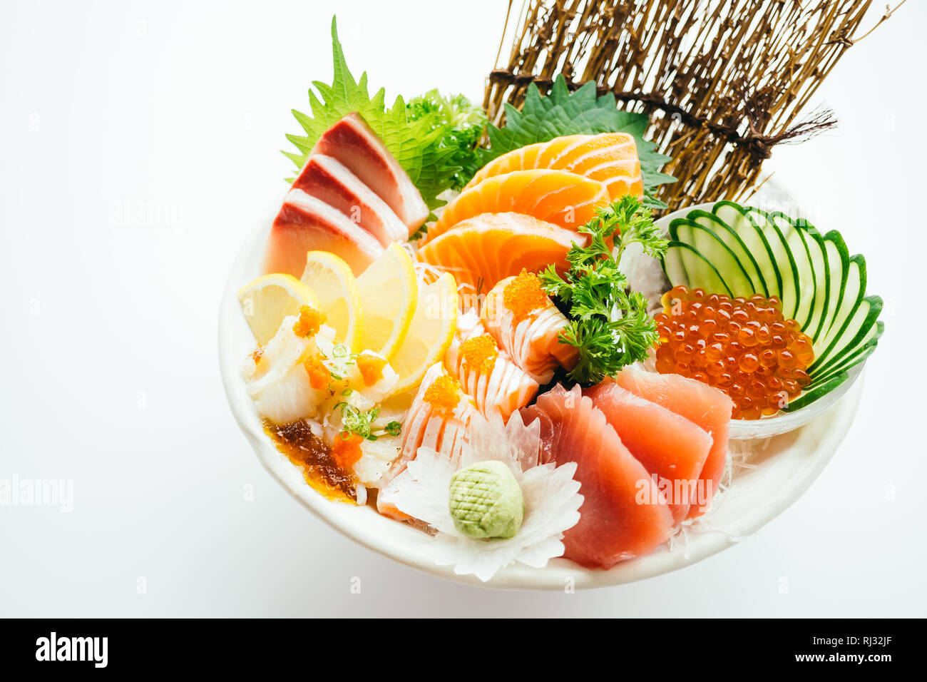 Raw and fresh mixed sashimi with salmon , tuna , hamaji and other fish ...