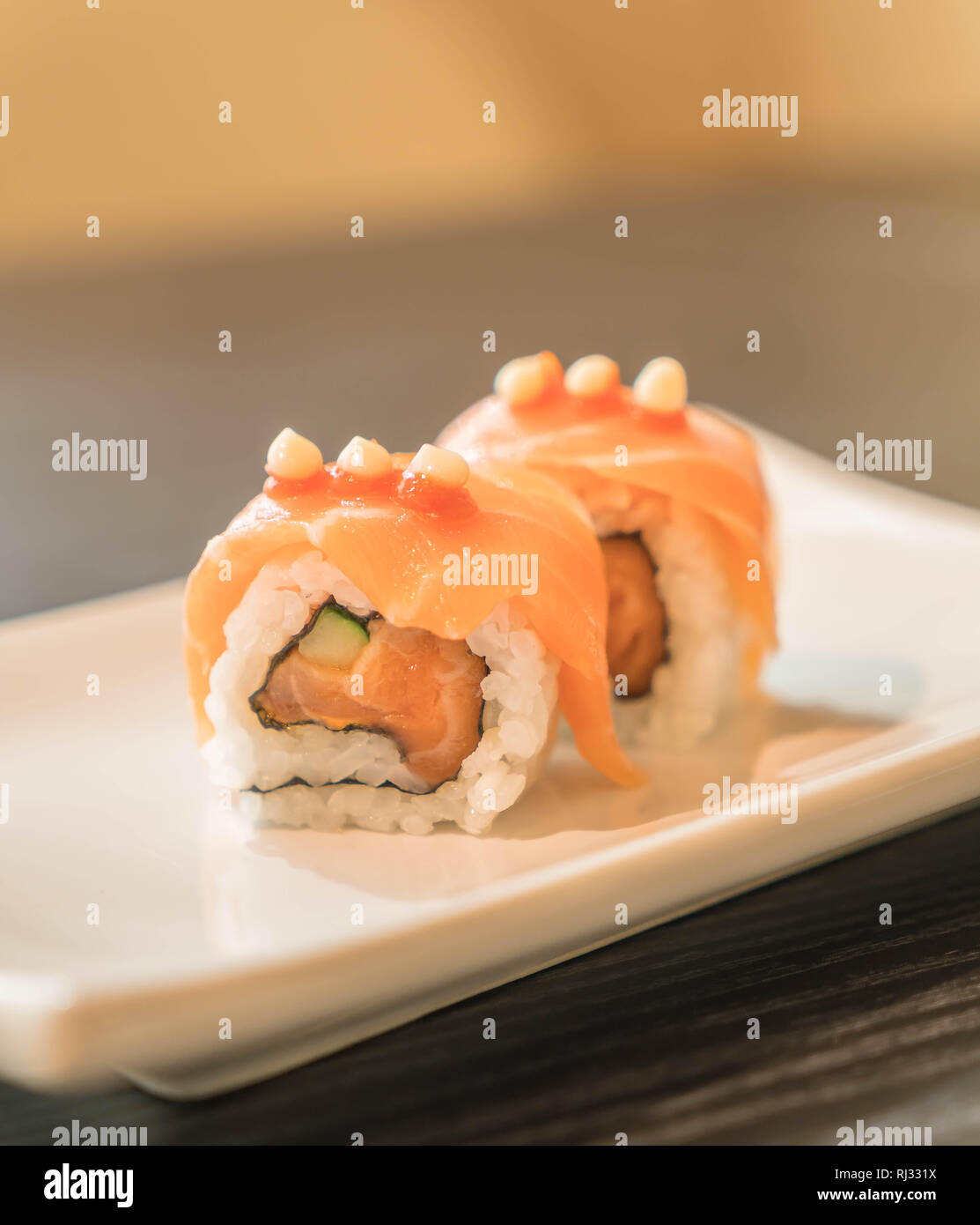 salmon burned maki - japanese food Stock Photo - Alamy