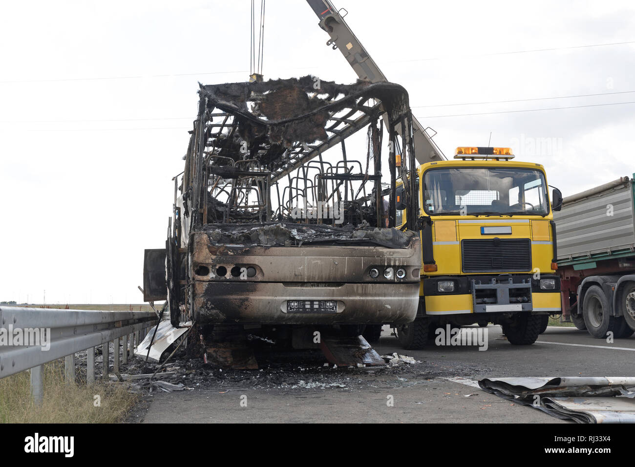 Burned Coach Bus Highway Recovery Assistance Stock Photo - Alamy