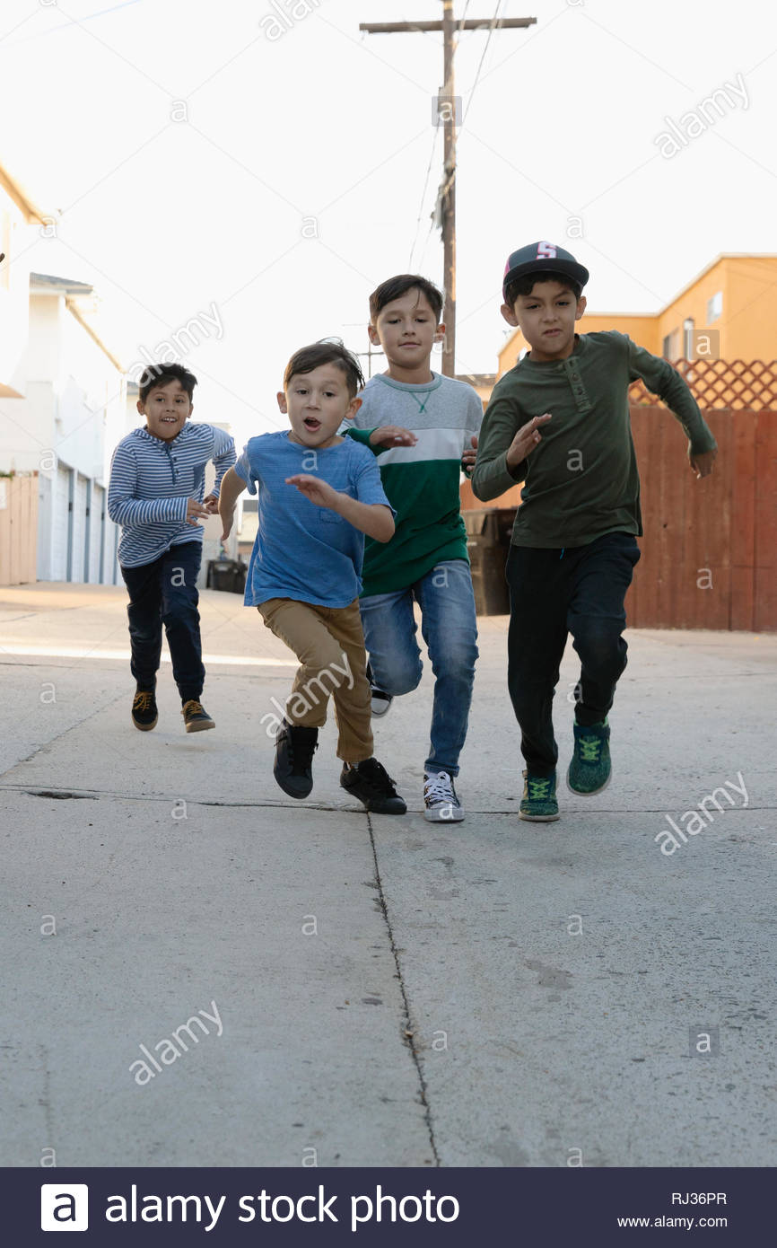 Boys running in competition hi-res stock photography and images - Alamy