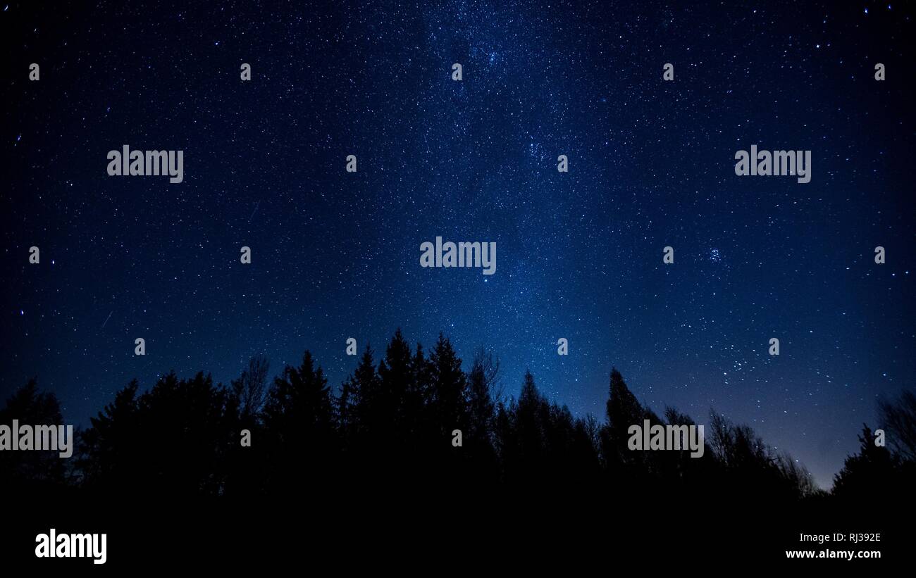 Night sky over rural landscape. Beautiful night starry sky landscape ...