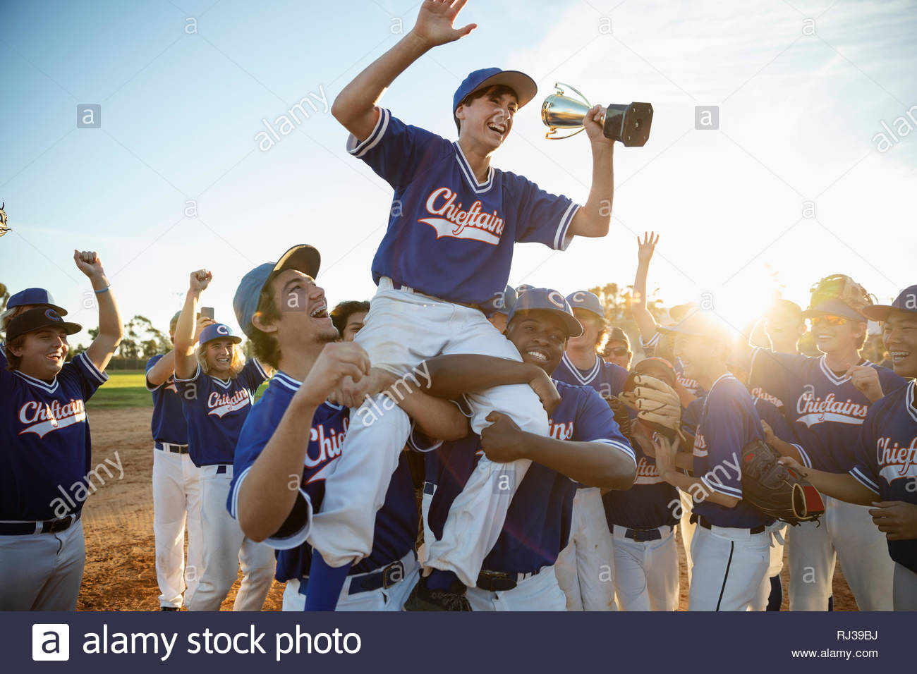 Sports celebration lifting teammate hi-res stock photography and images ...