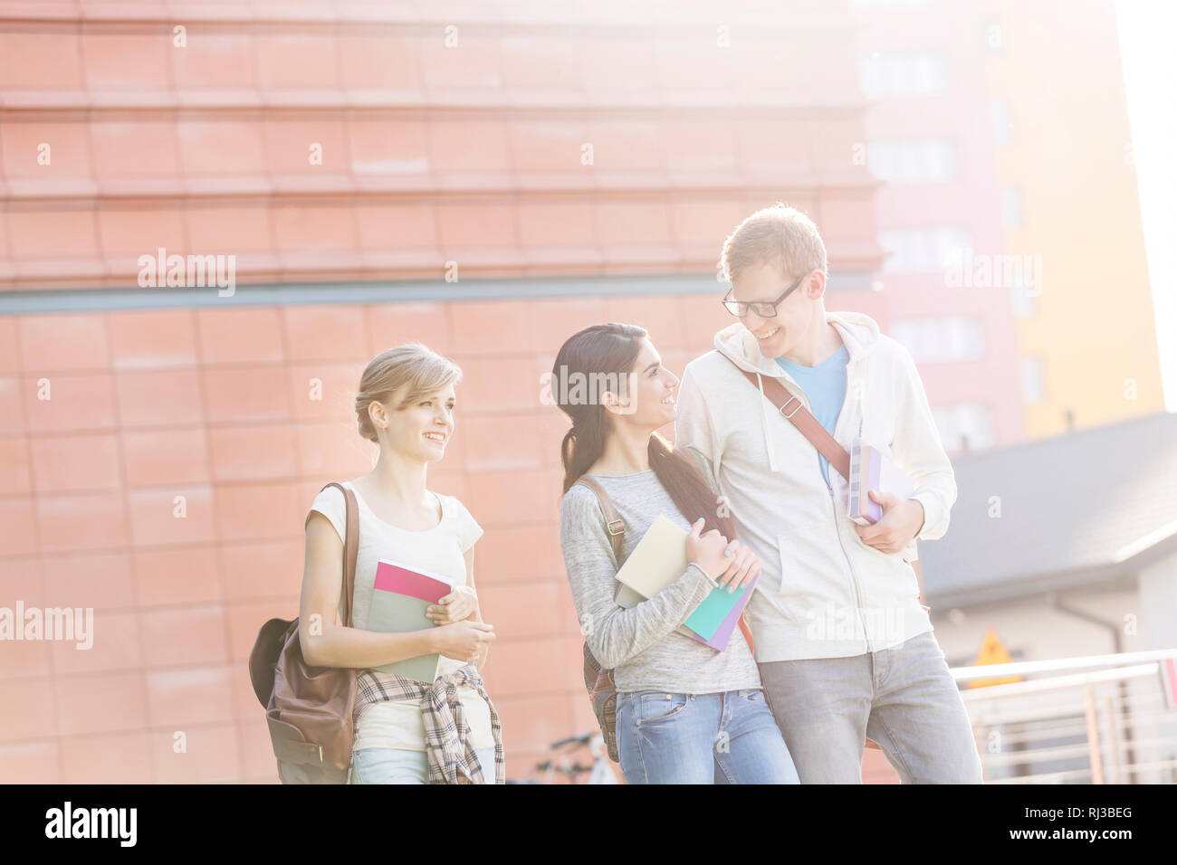 Three students walking university hi-res stock photography and images ...
