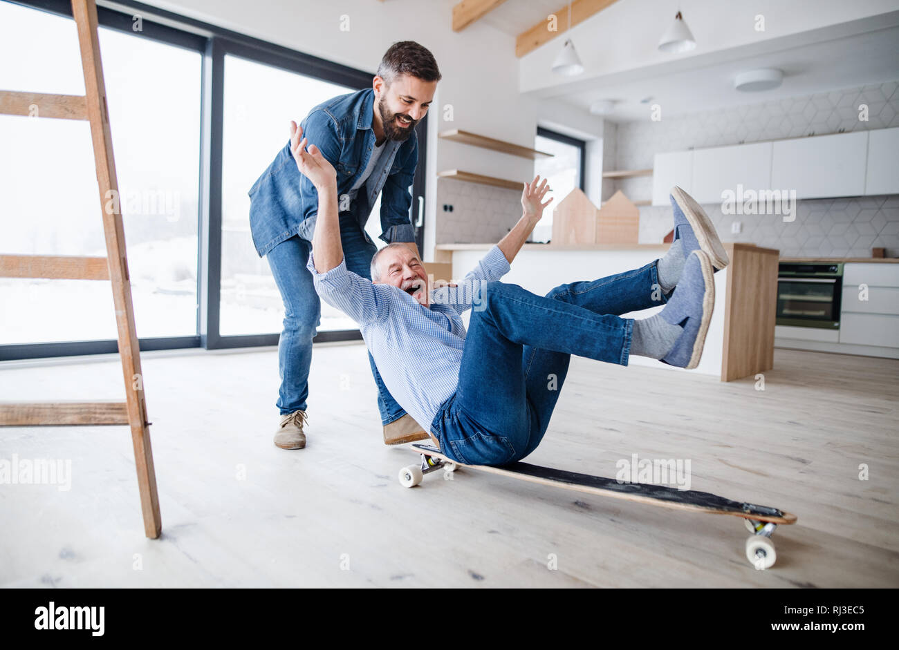 Two men talking in house hi-res stock photography and images - Alamy