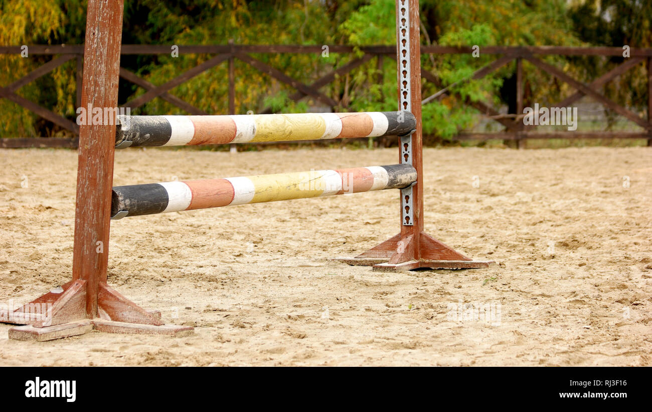 Wooden barrier for horses and riders jumping Stock Photo - Alamy