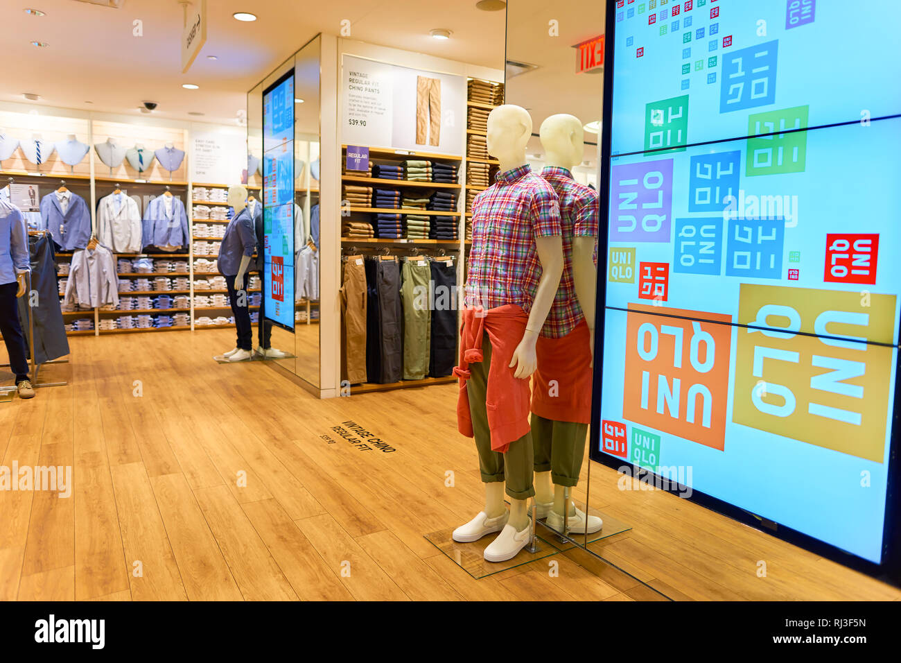 NEW-YORK - MARCH 20, 2016: inside of Uniqlo store. Uniqlo Co., Ltd. is ...