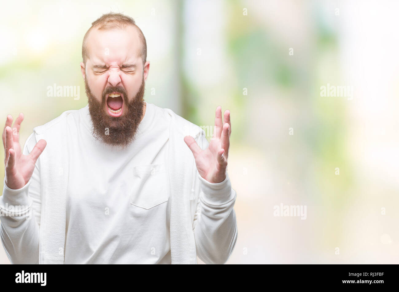 Young caucasian hipster man wearing sport clothes over isolated ...