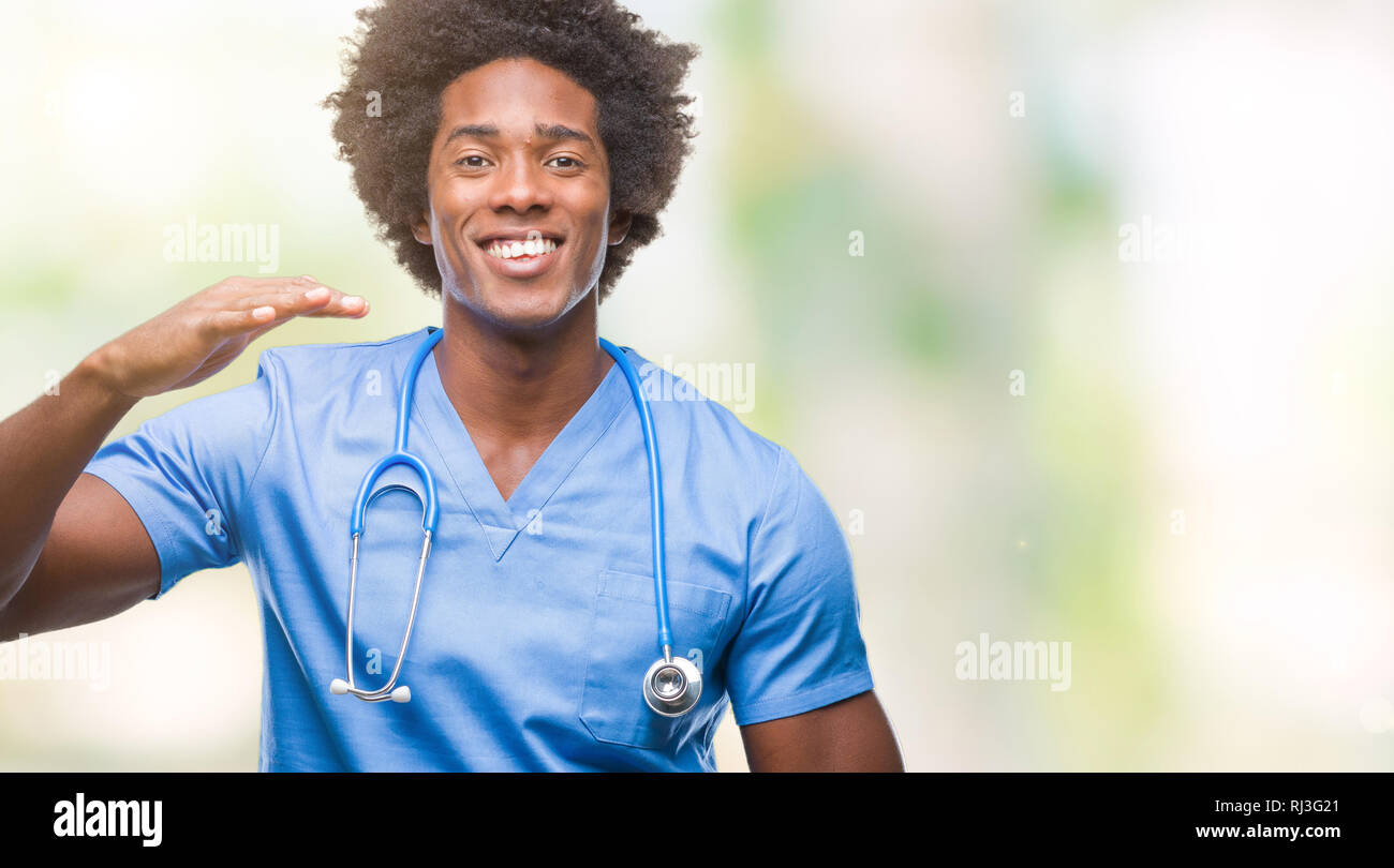 Afro american surgeon doctor man over isolated background gesturing ...
