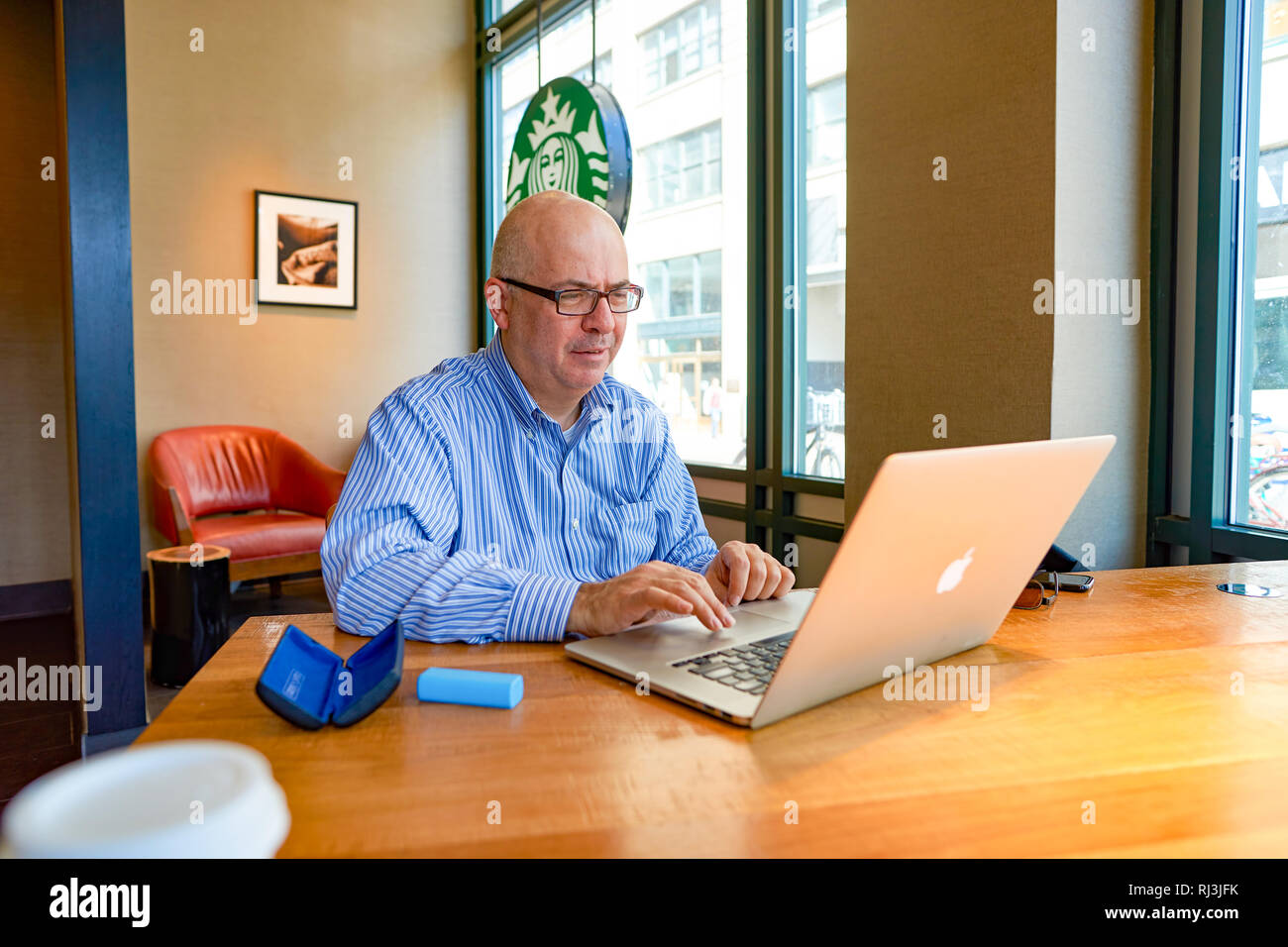NEW YORK - CIRCA MARCH 2016: man in Starbucks Cafe. Starbucks ...