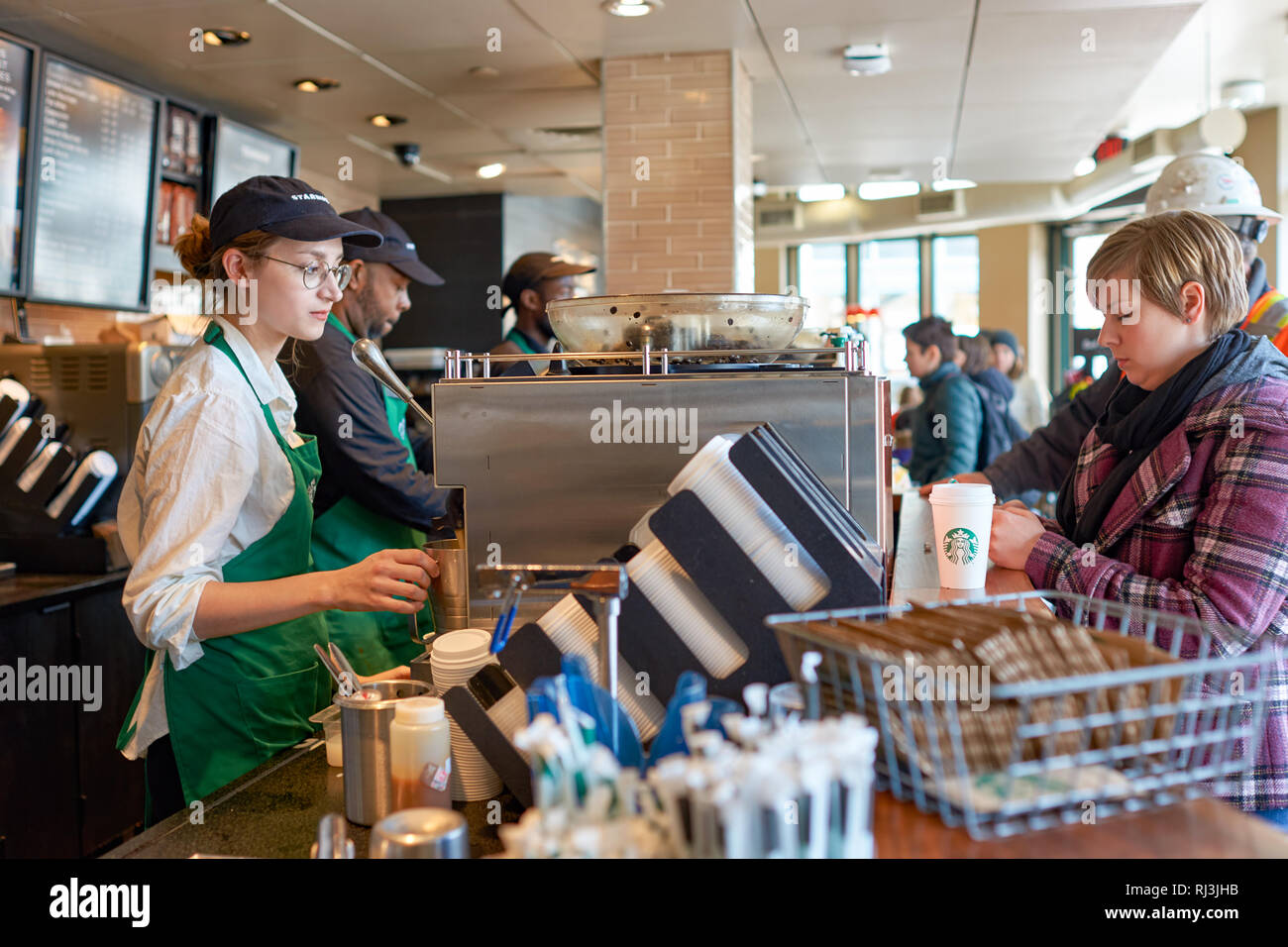 Starbucks barista customer hi-res stock photography and images - Alamy