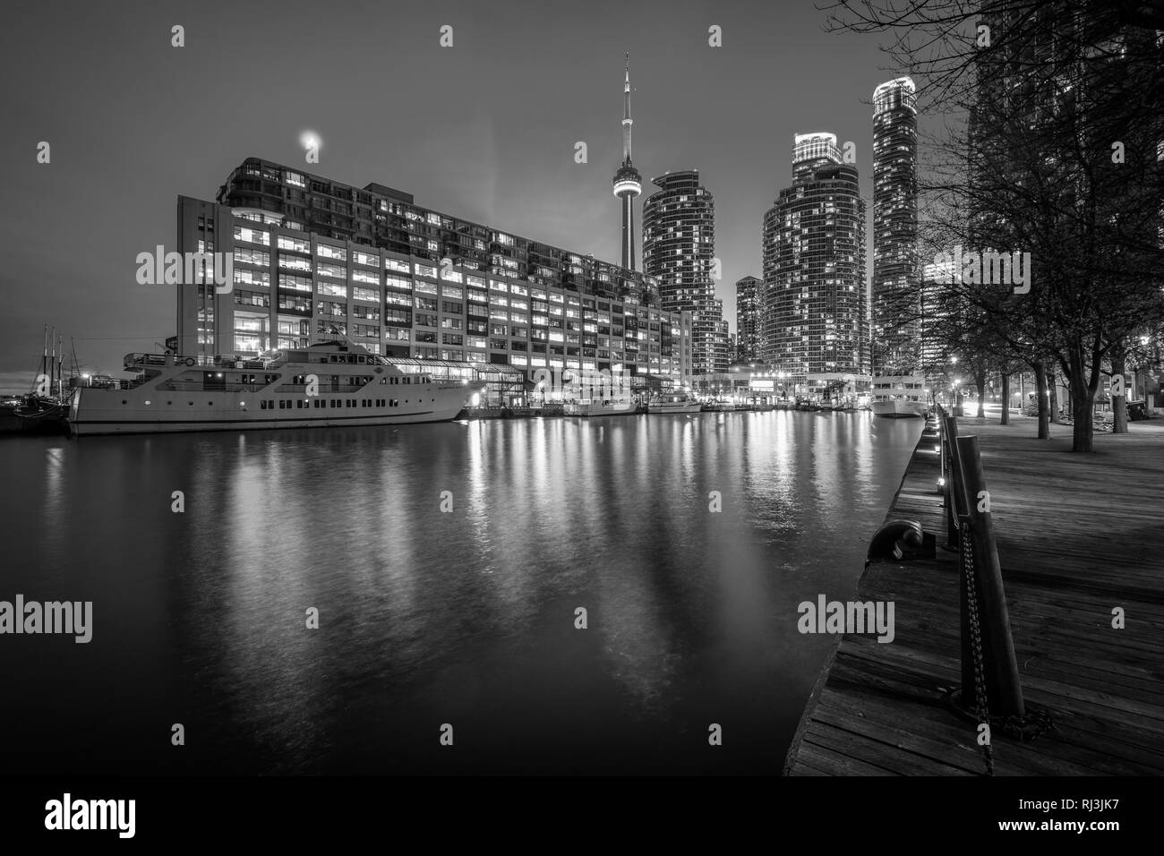 Buildings along Lake Ontario at night, at the Harbourfront in Toronto ...