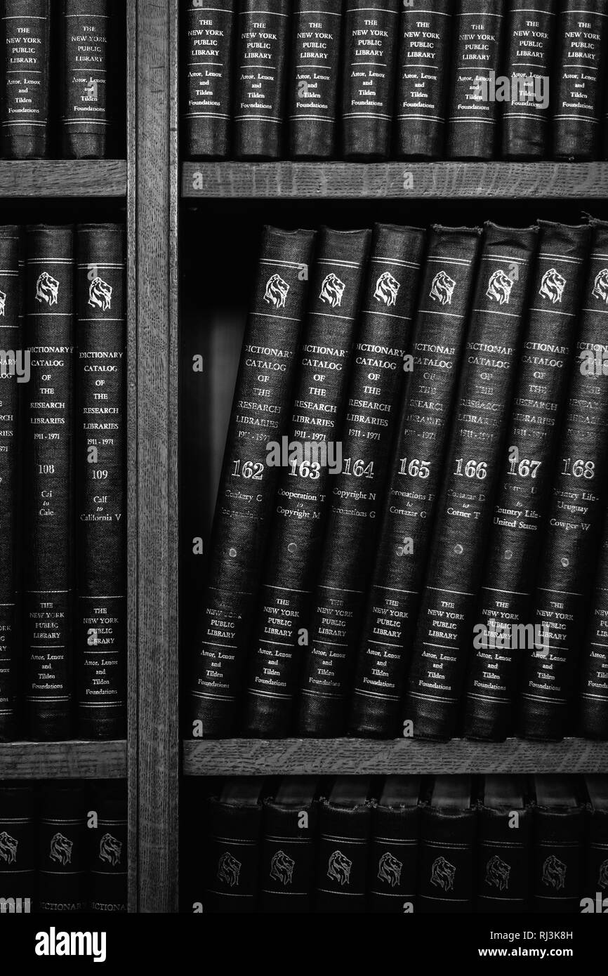 Books on a shelf at the New York Public Library in Midtown Manhattan ...