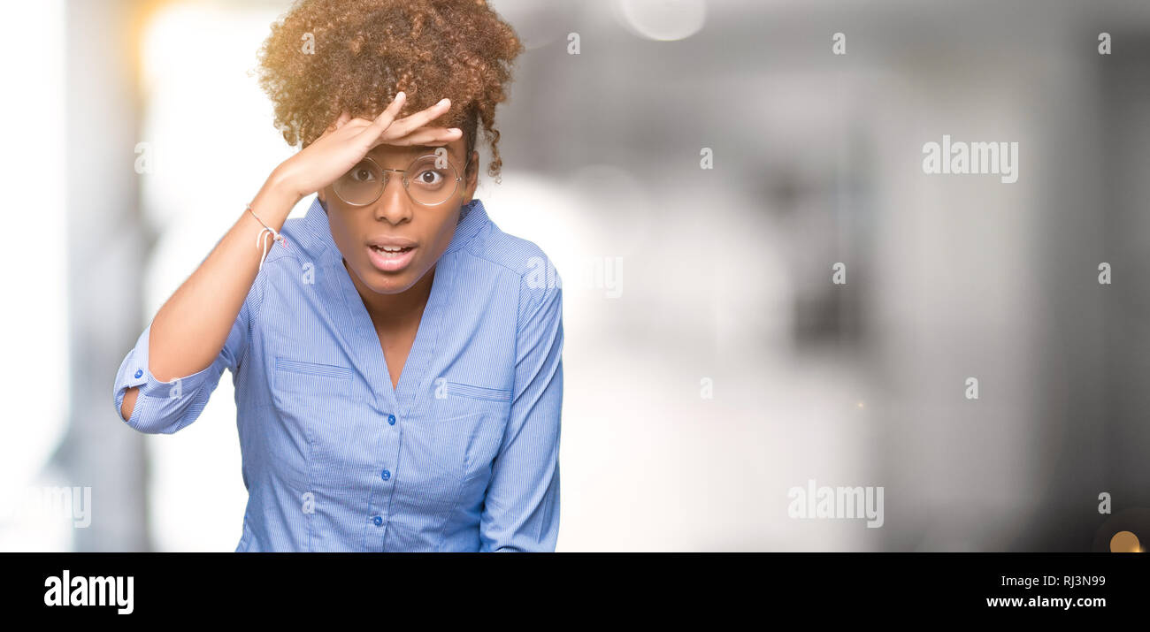 Beautiful young african american business woman over isolated ...