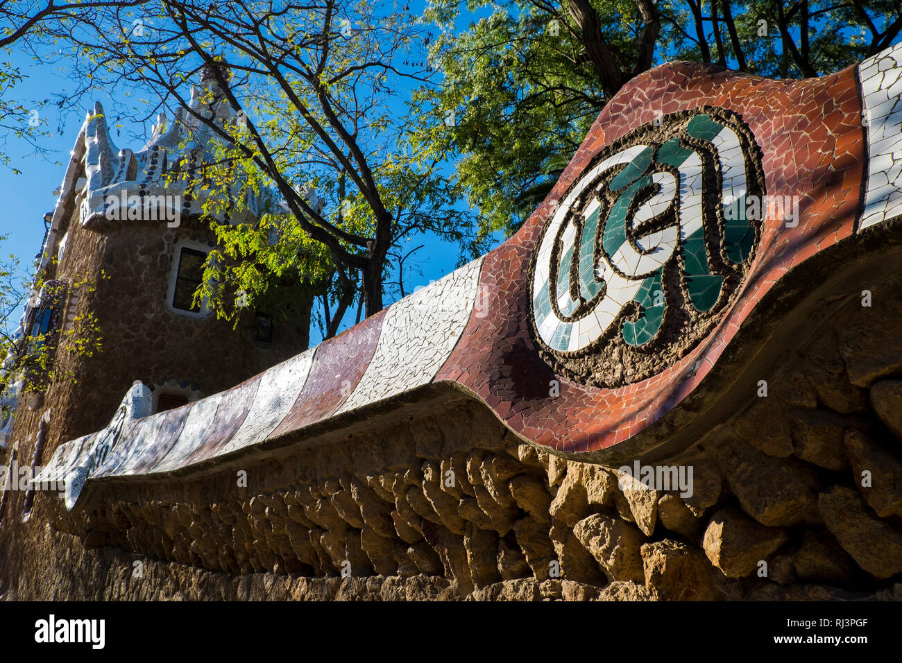 Park Guell. Garden complex with architectural elements situated on the ...